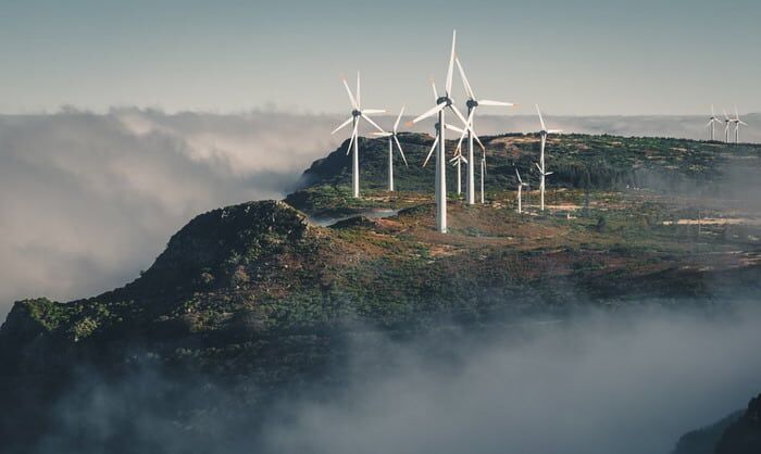 Why Do Wind Turbines Rotate Clockwise?